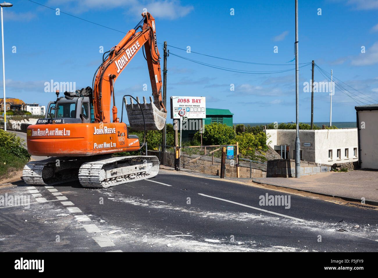 A digger makes it way down to the beach at Joss Bay, North Foreland ...