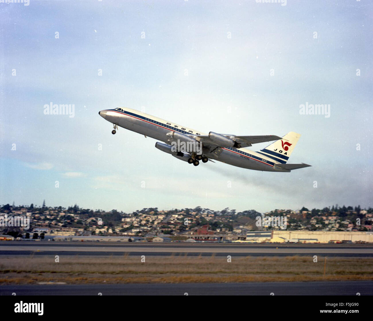 A Convair 880, tail number 001-65, is shown in a historical flight ...