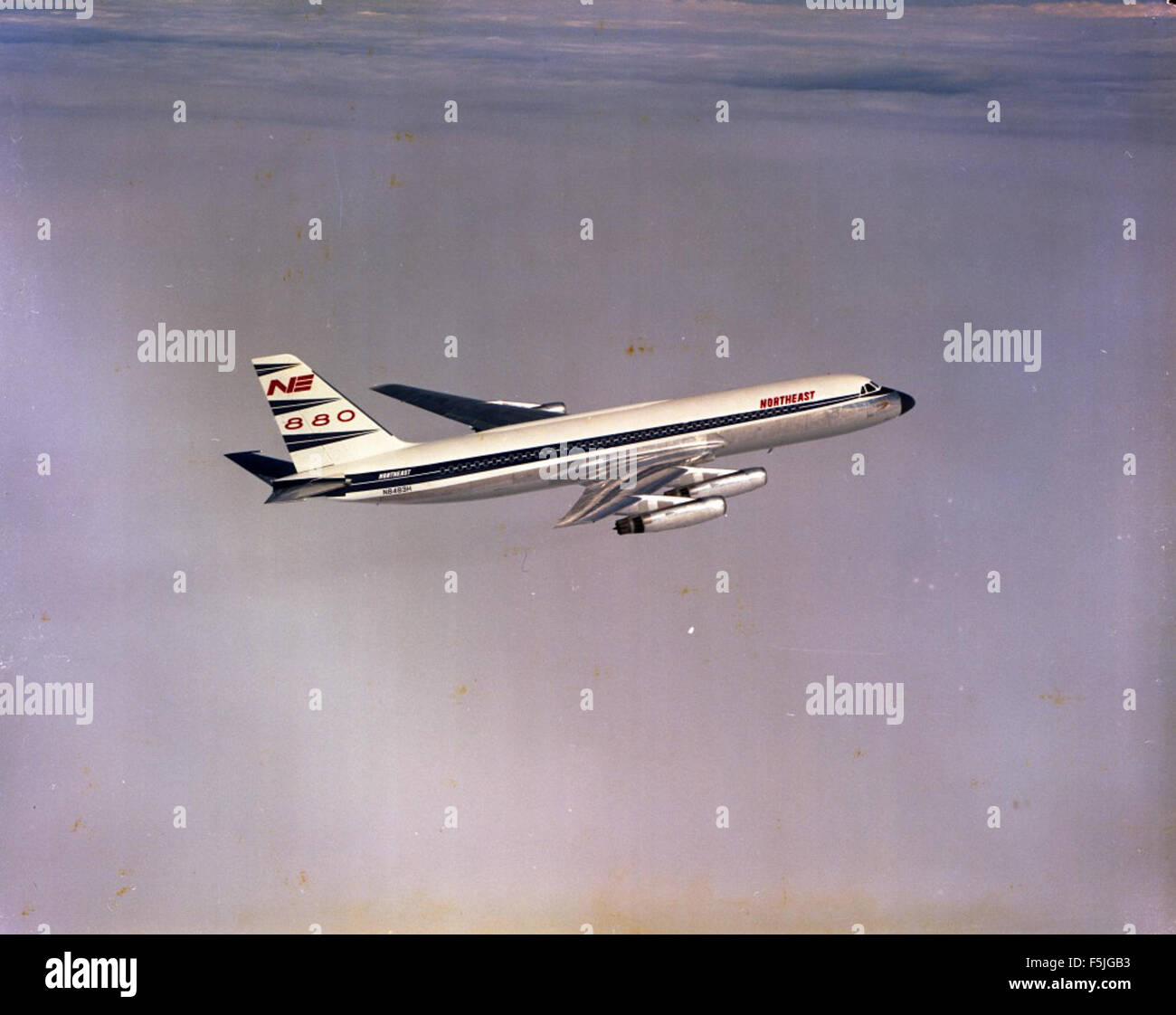 This image captures the Convair 880, tail number 580-60, in flight with ...
