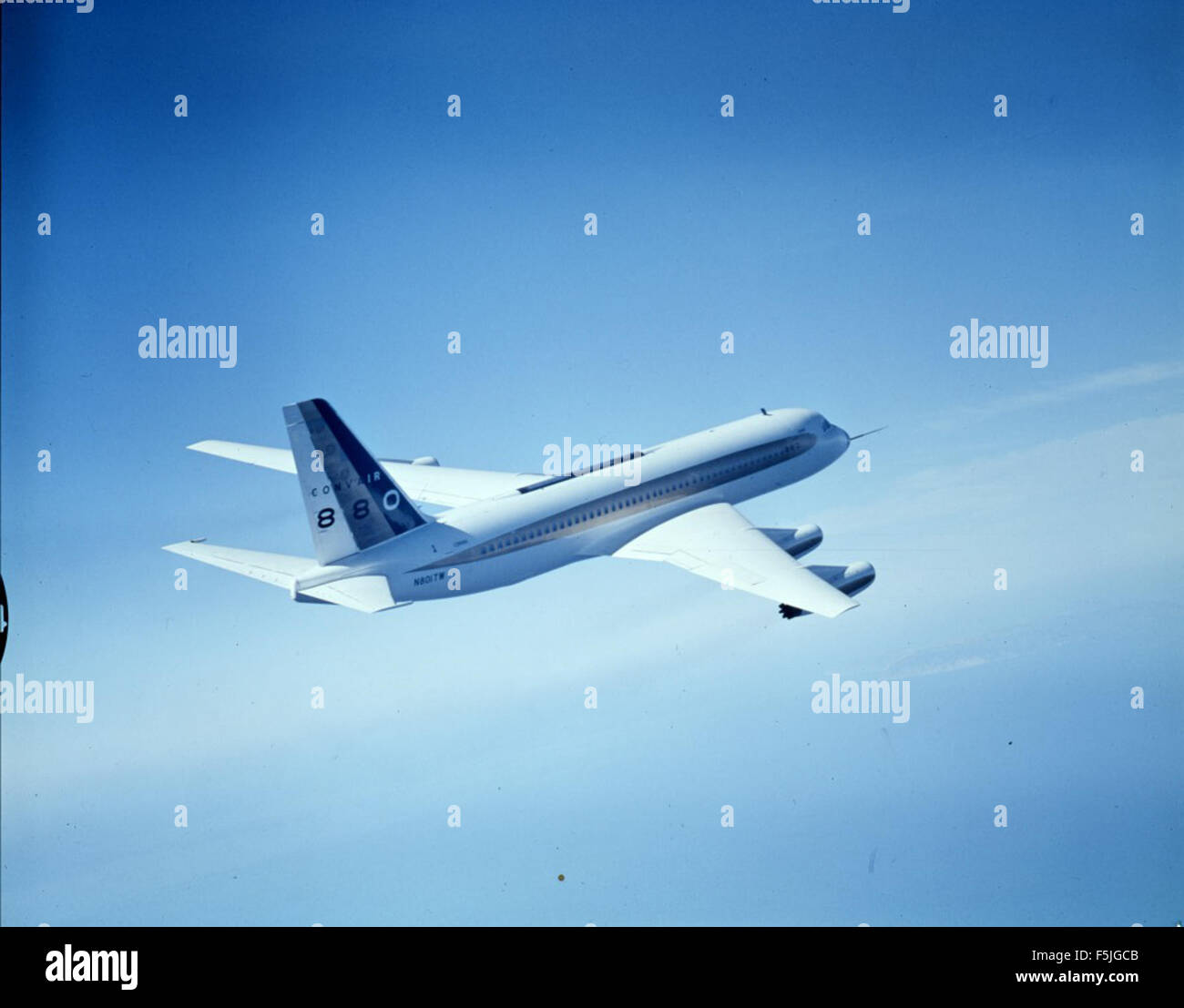 Convair 880 in flight Stock Photo - Alamy