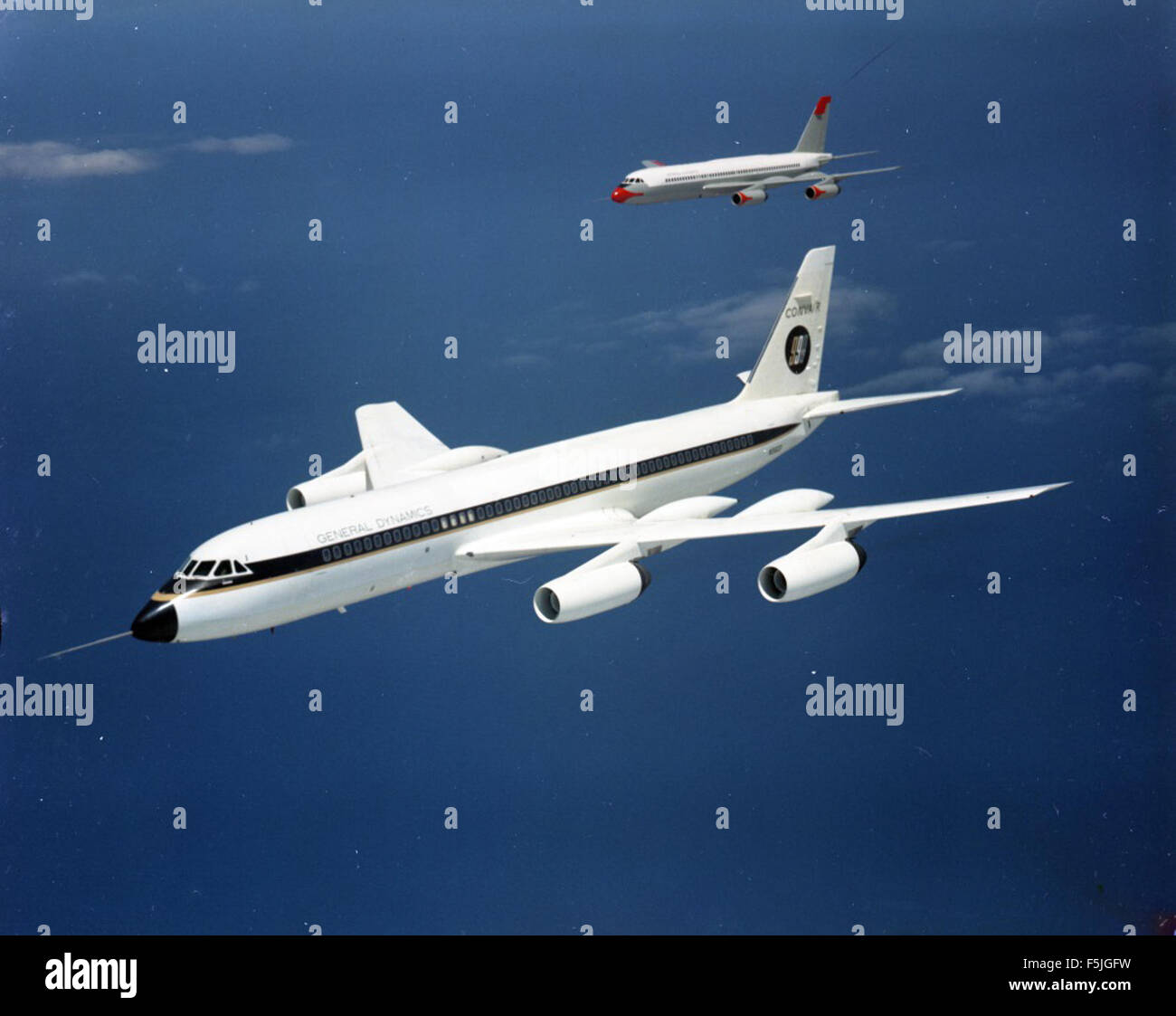 The Convair 990, a commercial jetliner, is shown in an air-to-air shot ...