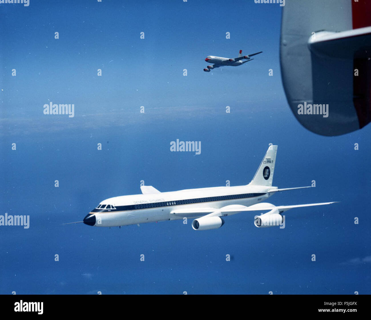 This image captures the Convair 990 in flight, an American airliner ...