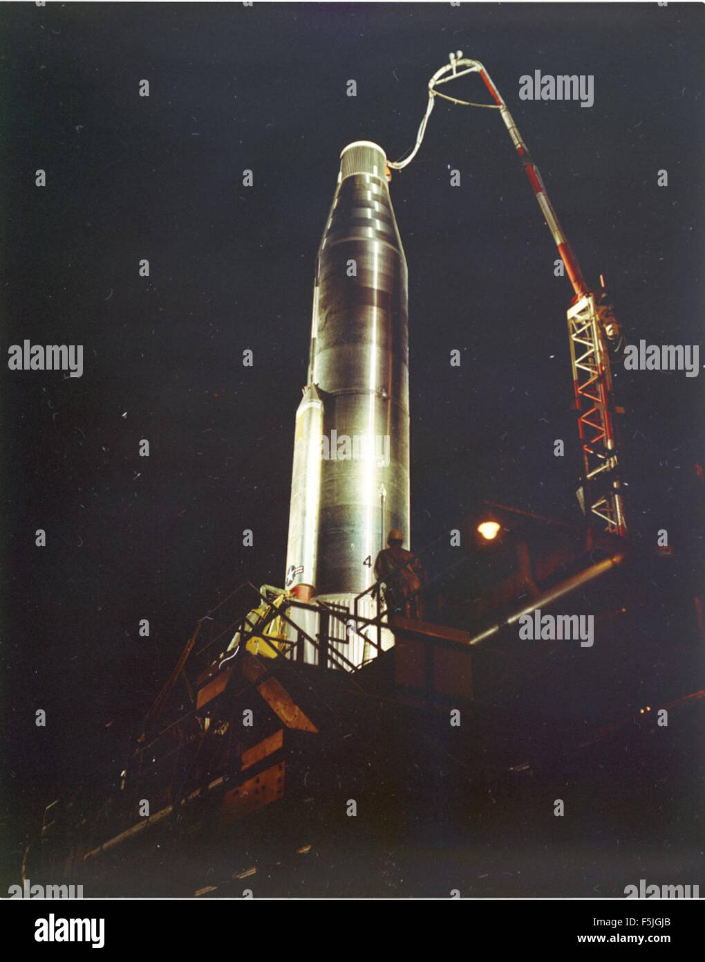 Photograph of the Atlas 40D missile positioned on Pad 13 at night ...