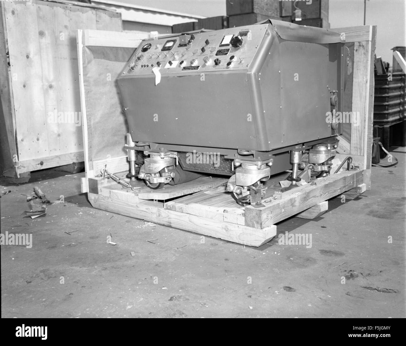 A photo showing the unpacking of damaged freight on July 24, 1957. This ...