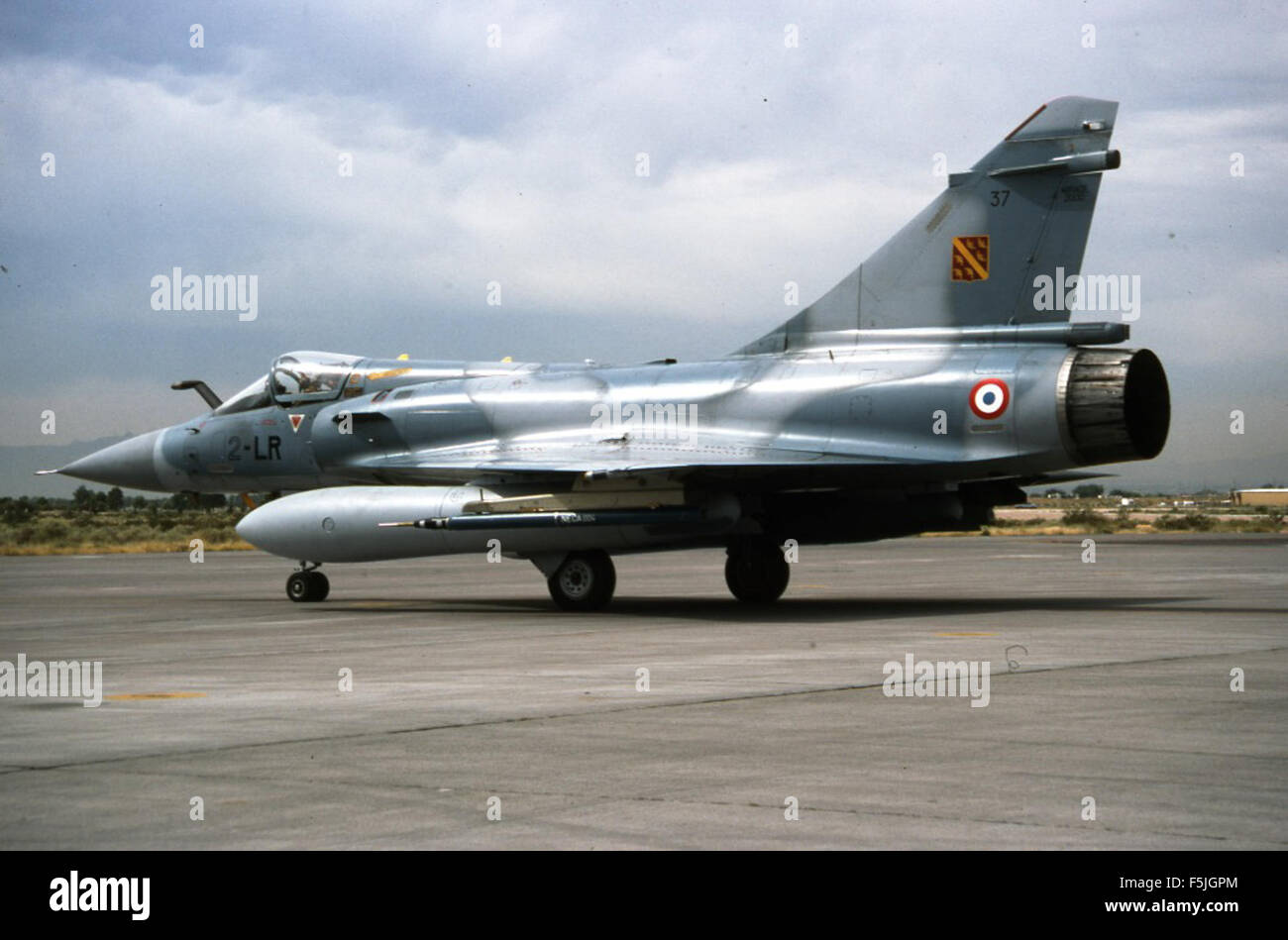 The image features a Dassault Mirage 2000 C 37 2-LR fighter aircraft at ...