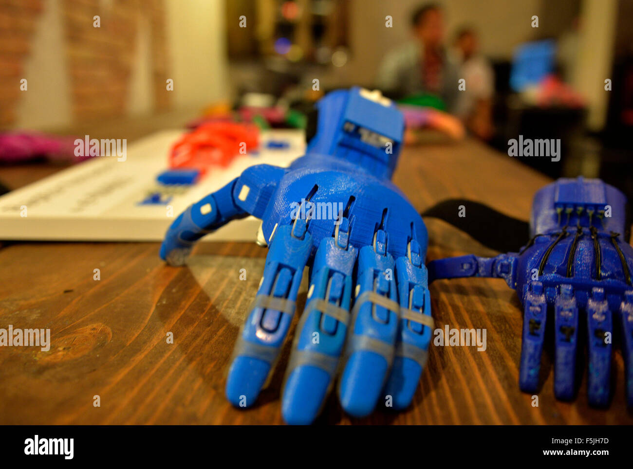 New York, USA. 5th Nov, 2015. 3D-printed prosthetic hands made by e ...