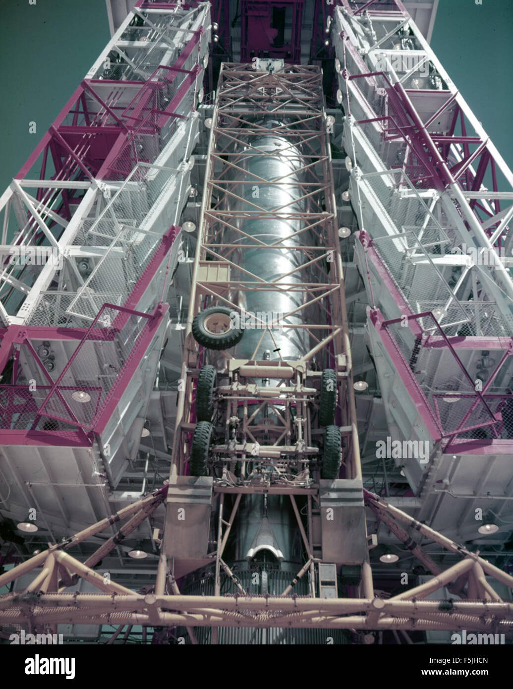 The Atlas 4A missile is being erected into the service tower at Complex ...