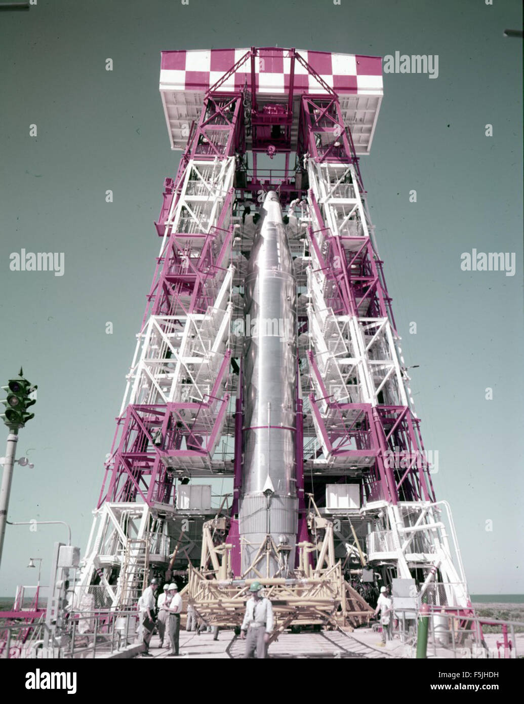 The Atlas 4A missile is shown in a launch tower without its transport ...