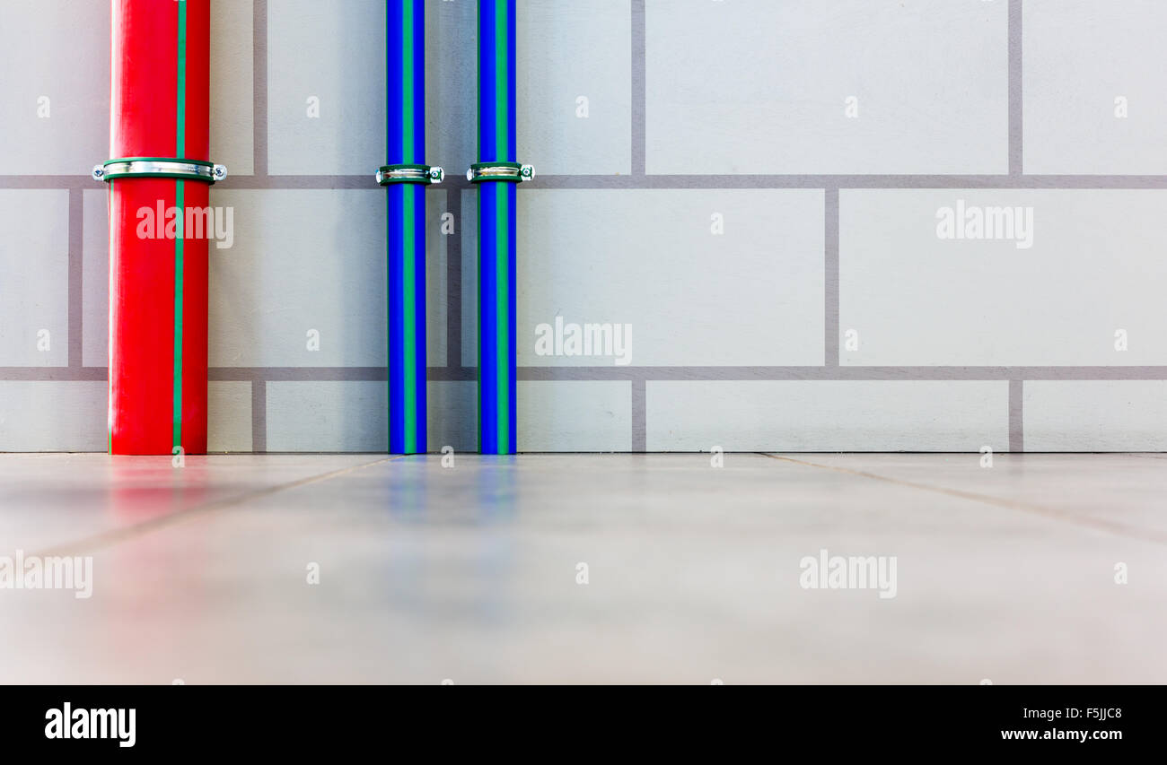 Red and blue water pipes Stock Photo - Alamy