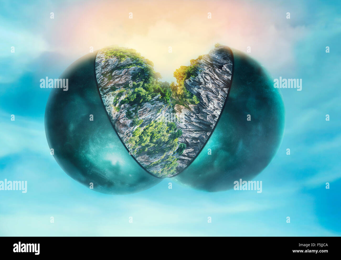 The earth separated in two parts over blue background Stock Photo - Alamy