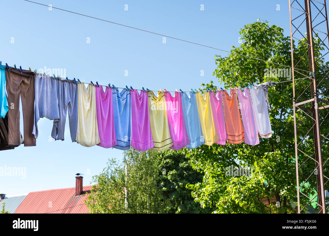 Colorful linen drying on the nature, summer time Stock Photo - Alamy