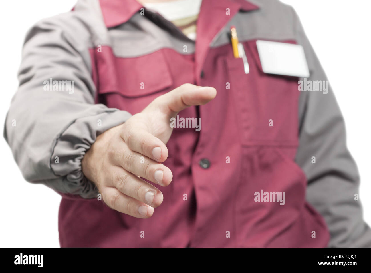 Worker giving a hand for handshake Stock Photo - Alamy