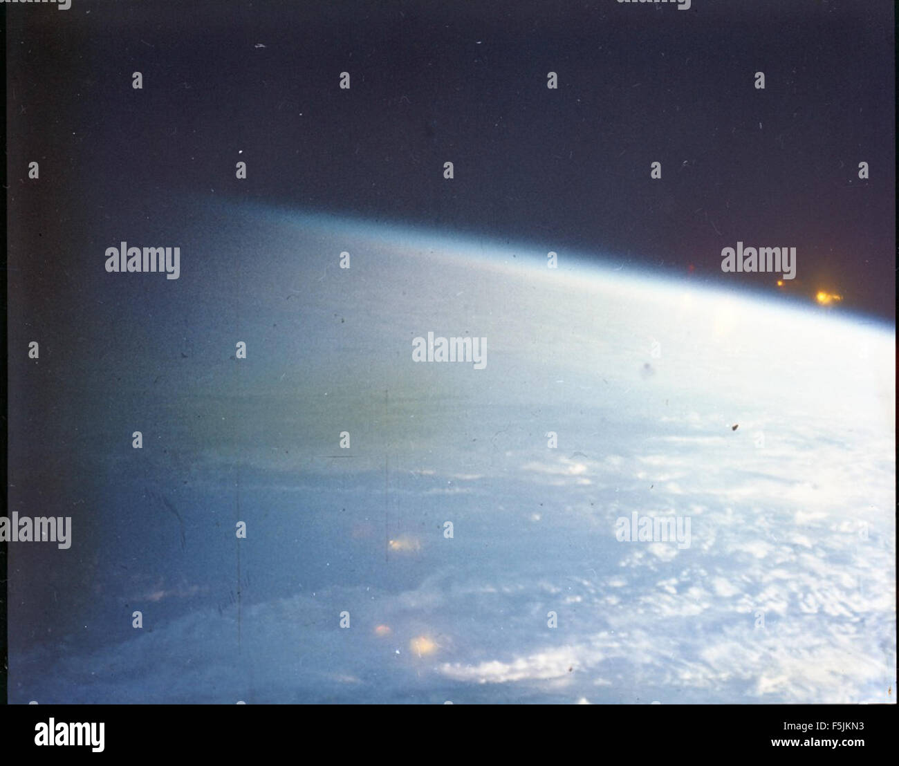A photograph taken from the Atlas 71D, showing Earth as captured by the ...