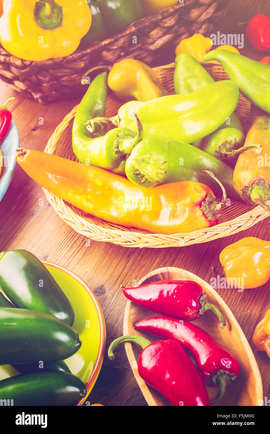 Variety of fresh organic peppers on the table Stock Photo - Alamy