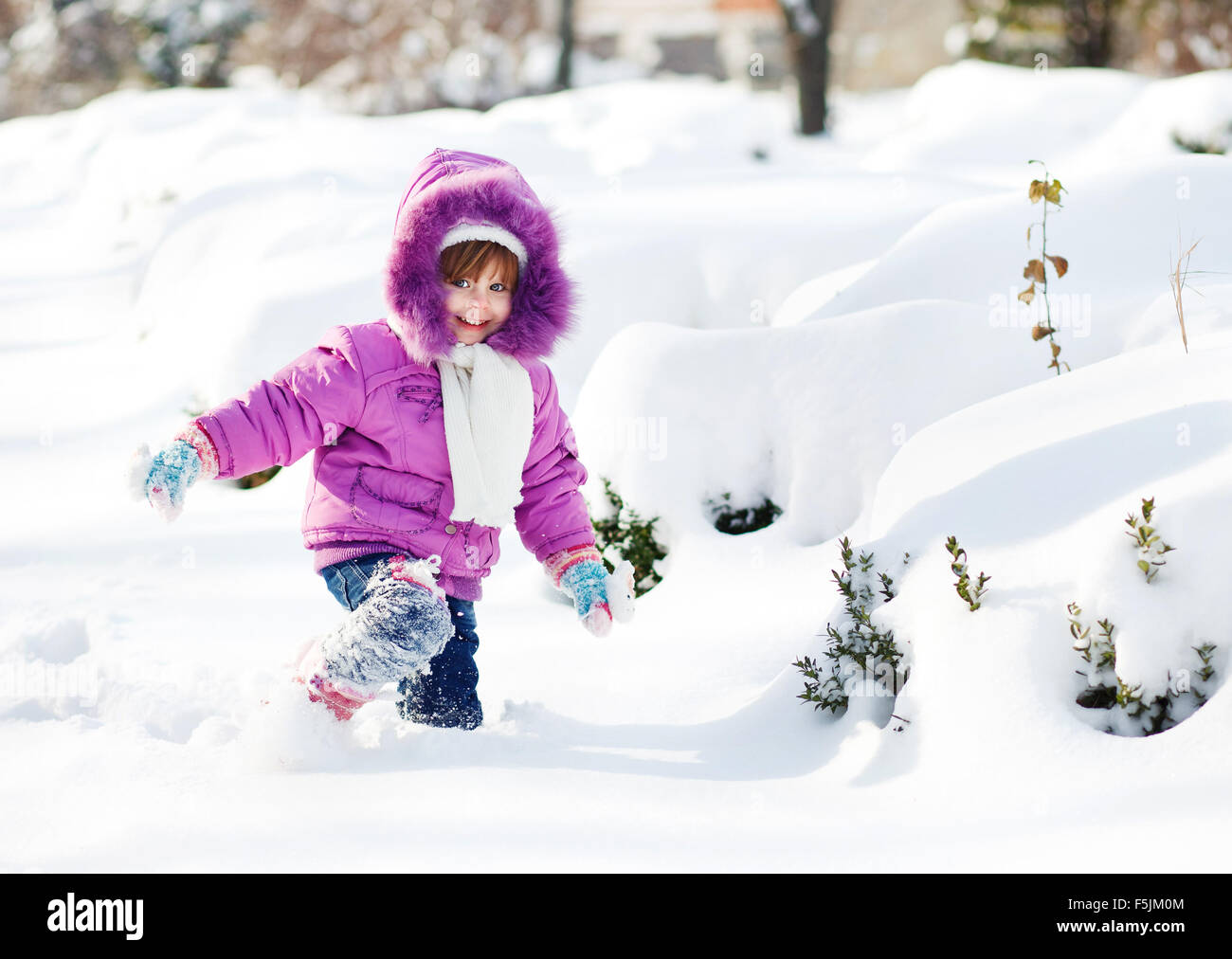 Girl in the Snow Stock Photo - Alamy