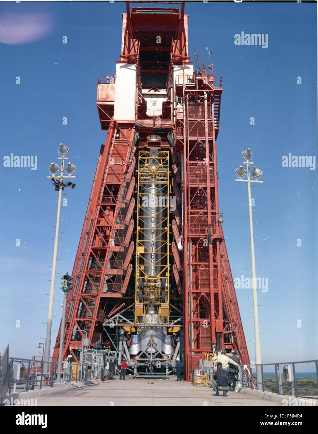 Photograph documenting the erection of Atlas Booster 99D, a crucial ...