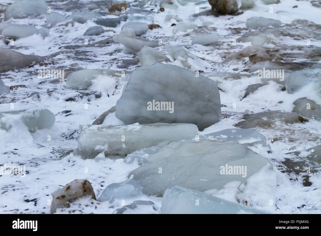Snow and ice covering Lake Michigan at the St. Joseph North Pier head ...