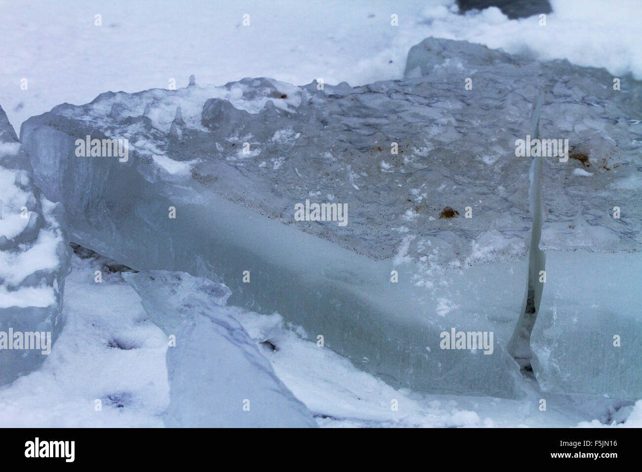 Snow and ice covering Lake Michigan at the St. Joseph North Pier head ...