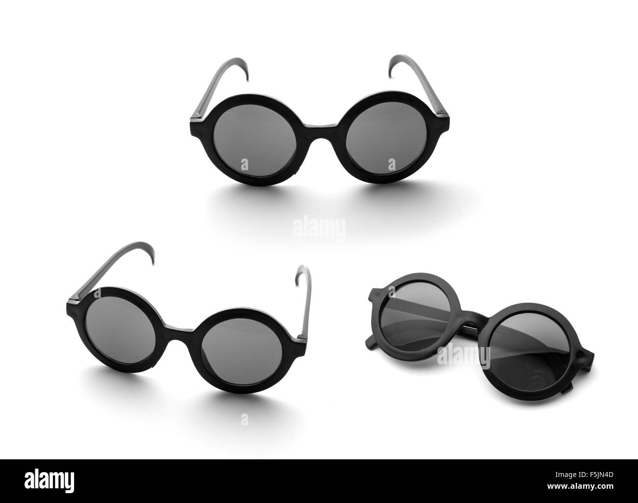 Three pairs of black round glasses isolated on white background Stock ...