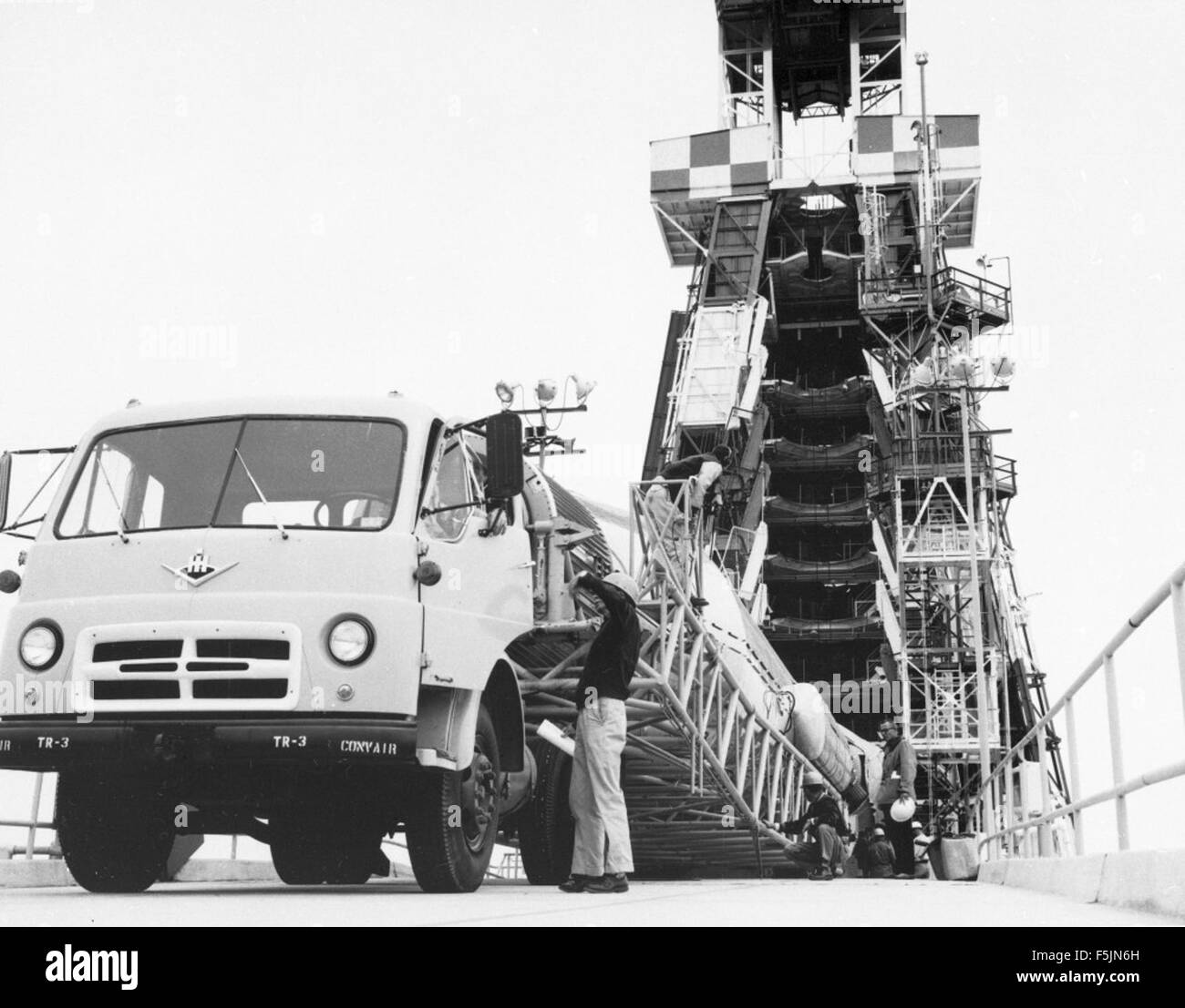 Atlas 9C missile being erected and trailer unhitching at Pad 12. Image ...