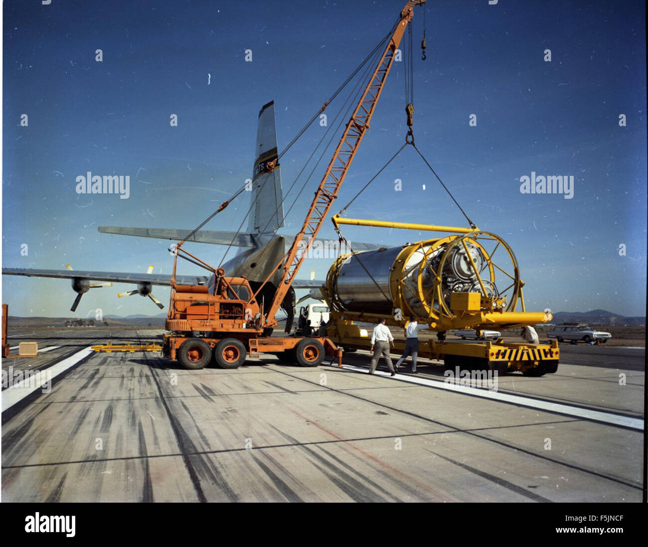 Detailed image showing the Centaur rocket being loaded with a crane ...