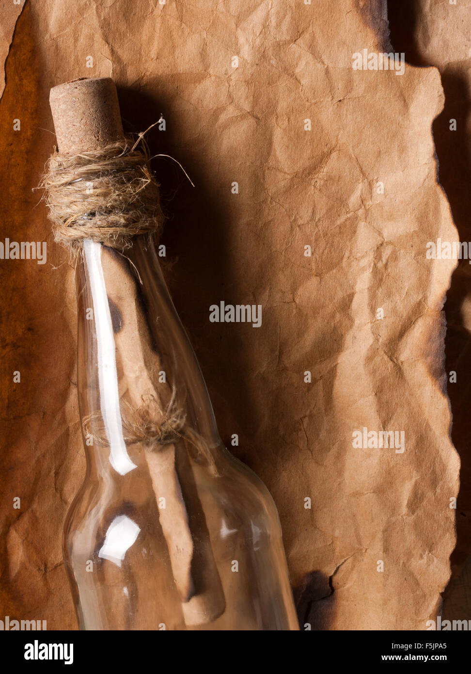 Antique rolled message in a bottle Stock Photo - Alamy