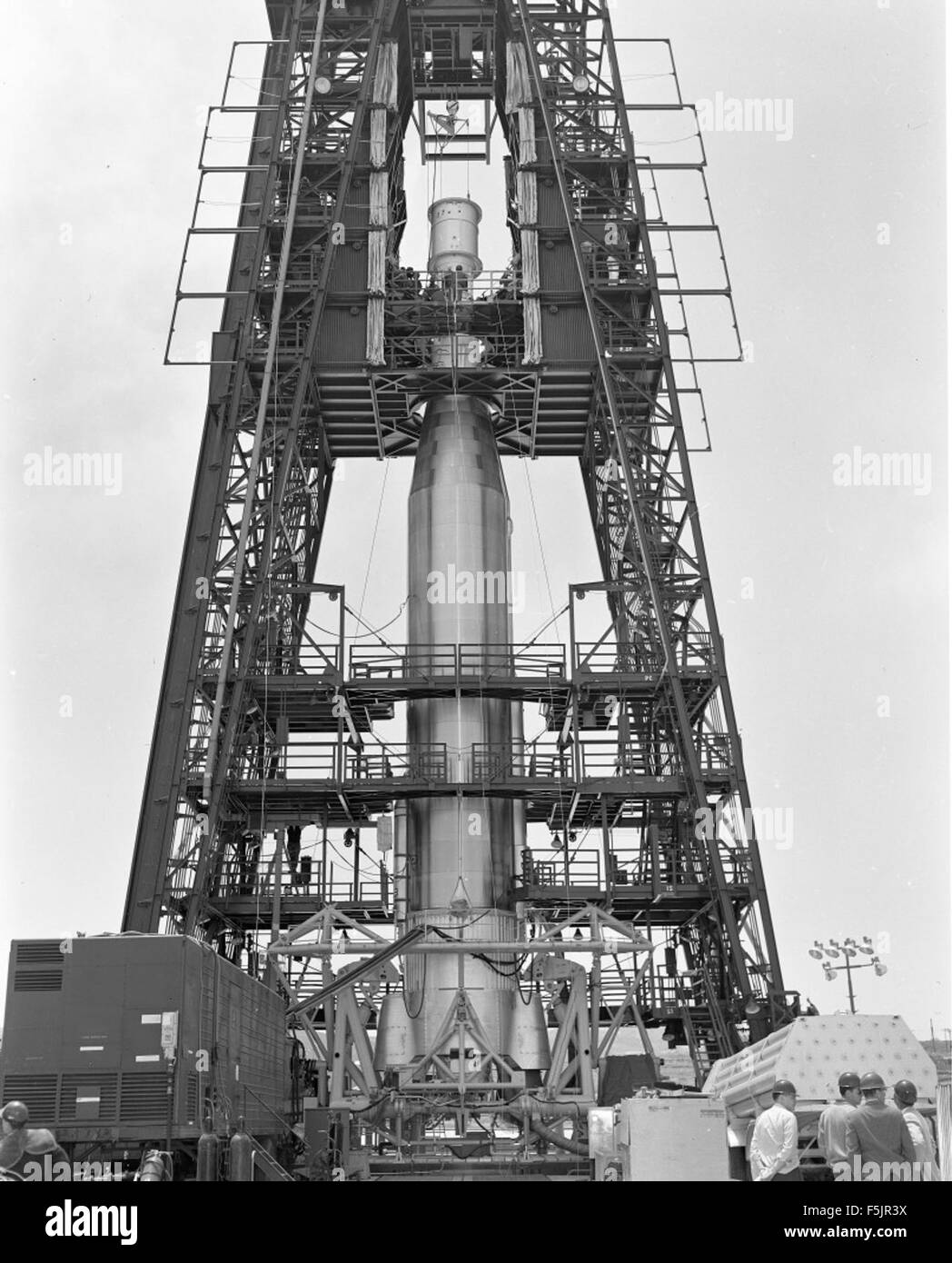 This image shows the Atlas Centaur 7 rocket being raised on a trailer ...
