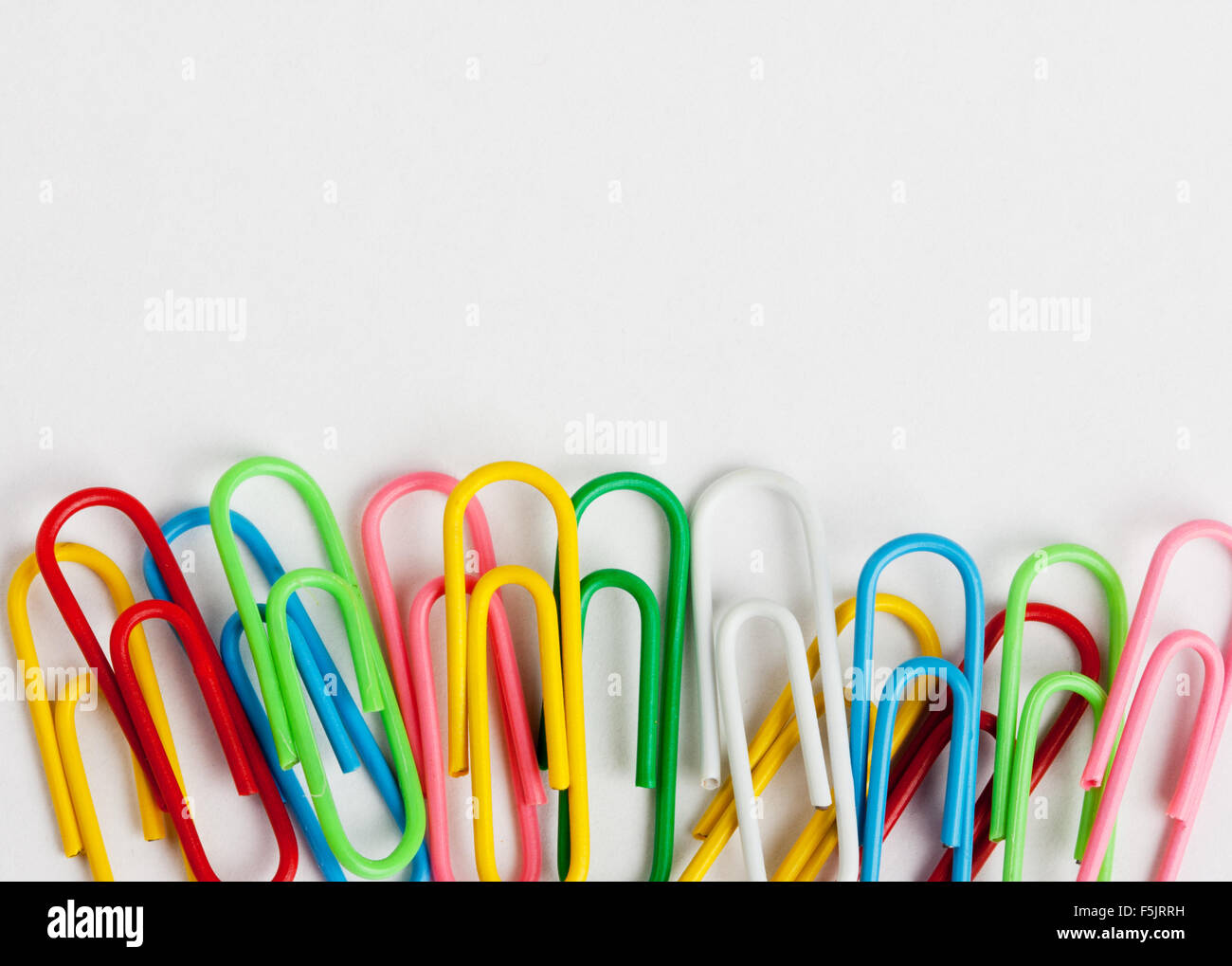 Many colorful paper clips. Use for background Stock Photo - Alamy