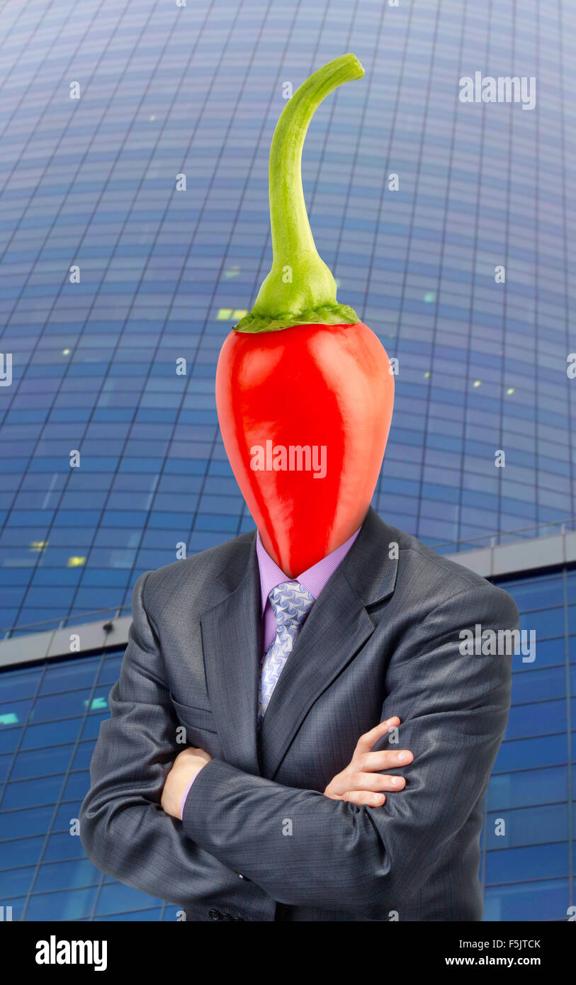 Portrait of successful businessman with chili pepper instead of head ...