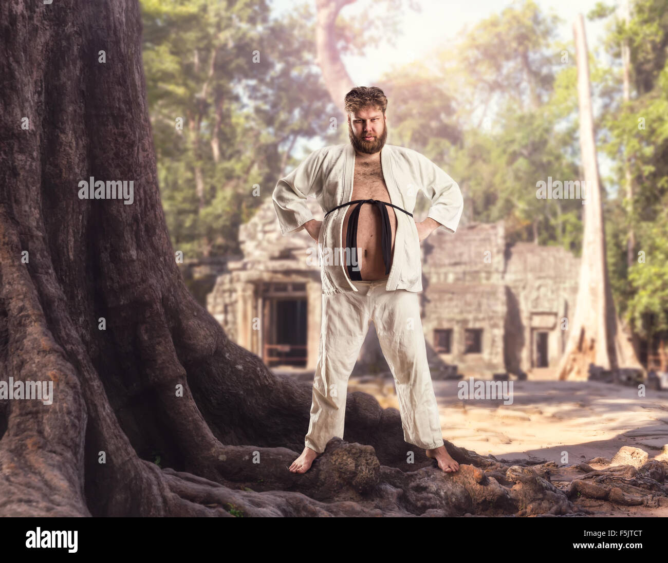 Fat bearded karate fighter in white kimono in the open air Stock Photo ...