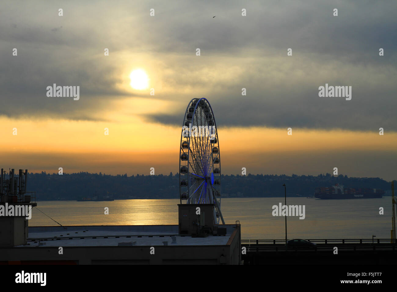 Great wheel, a giant ferris wheel, at sunset on pier 57 in downtown ...