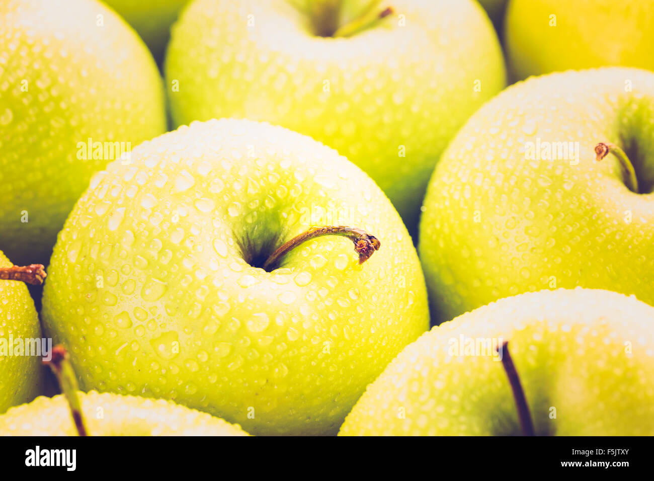 Close up of organic Golden Delicious apples Stock Photo - Alamy