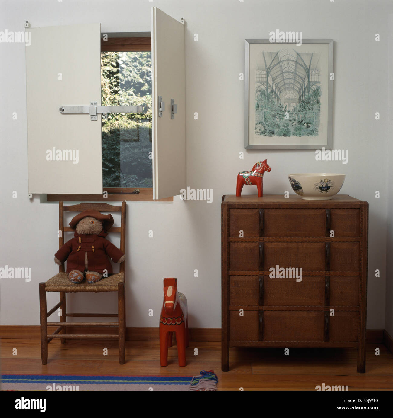 Arts+Crafts chest-of drawers in bedroom with ladder-back chair below ...
