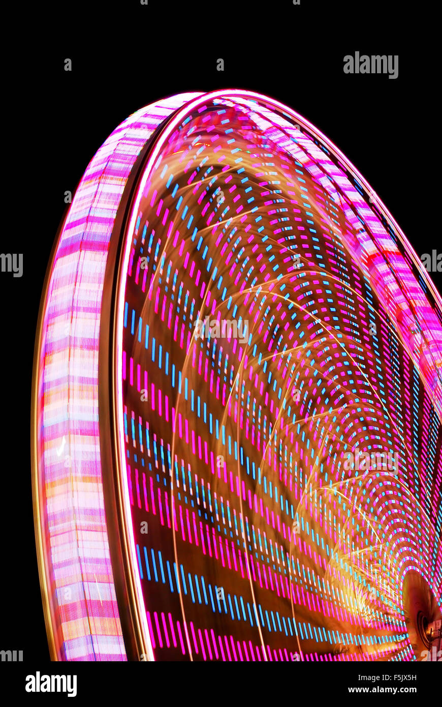 ferris wheel spinning Stock Photo - Alamy