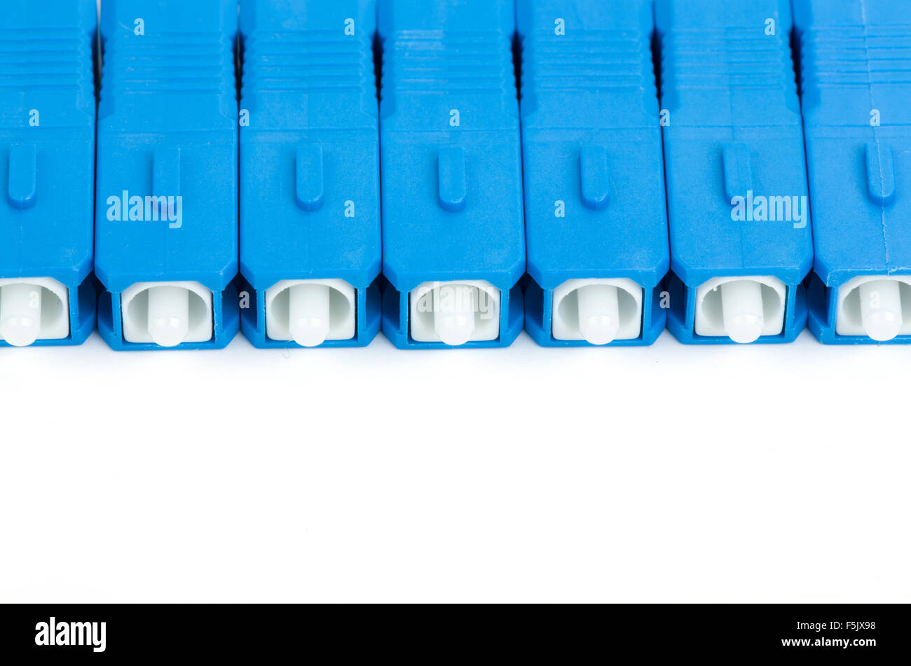 blue fiber optic SC connectors with reflection isolated on white ...