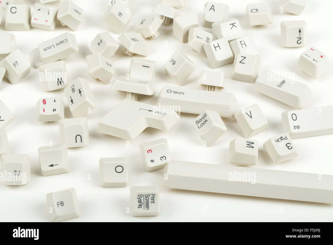 pile of scattered white keyboard keys on white background Stock Photo ...