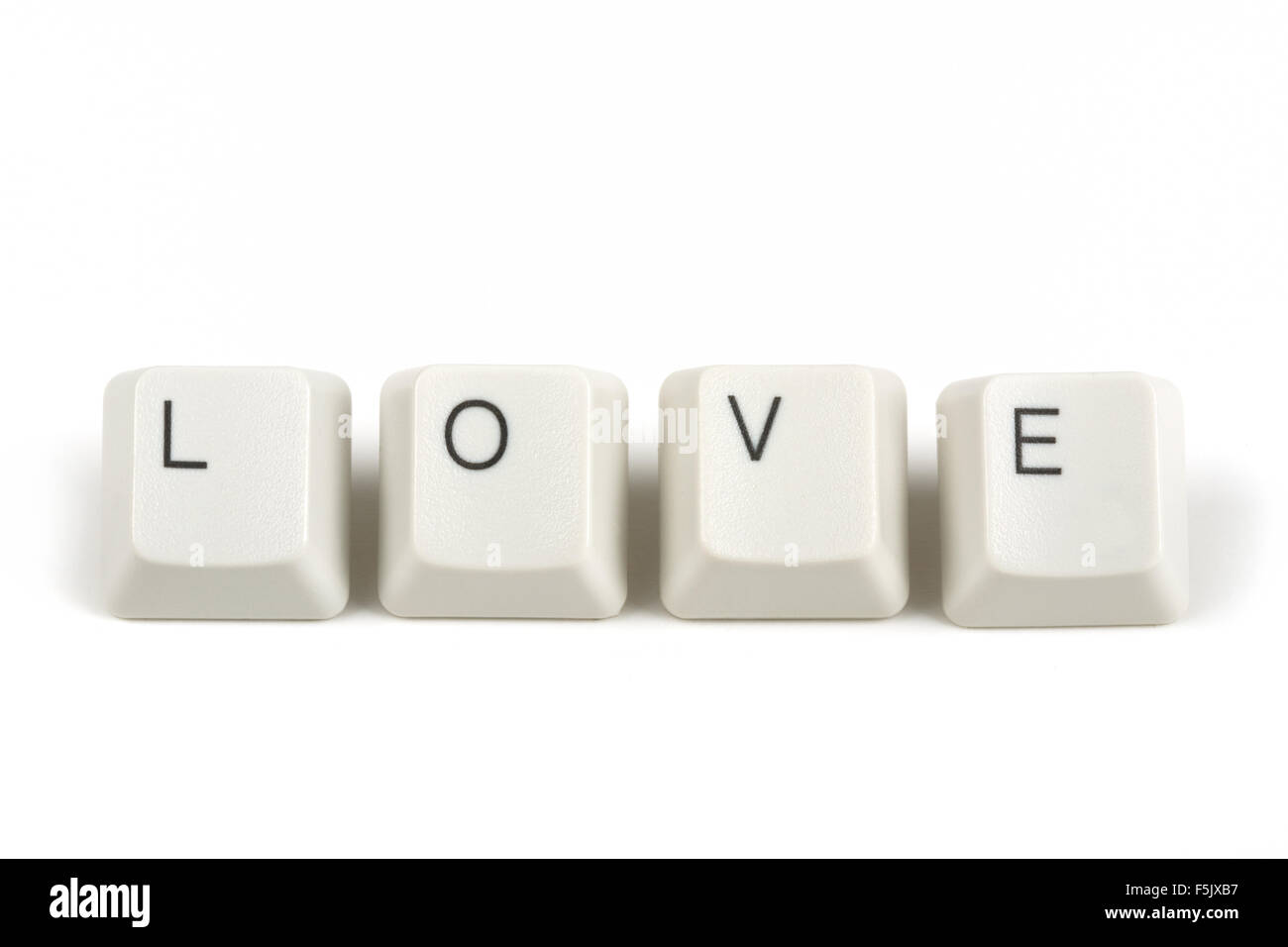 love text from scattered keyboard keys isolated on white background ...