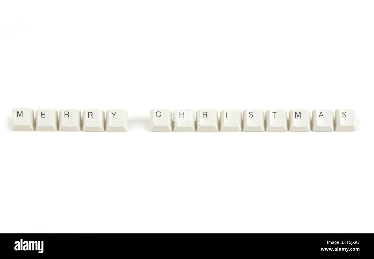 merry christmas text from scattered keyboard keys isolated on white ...
