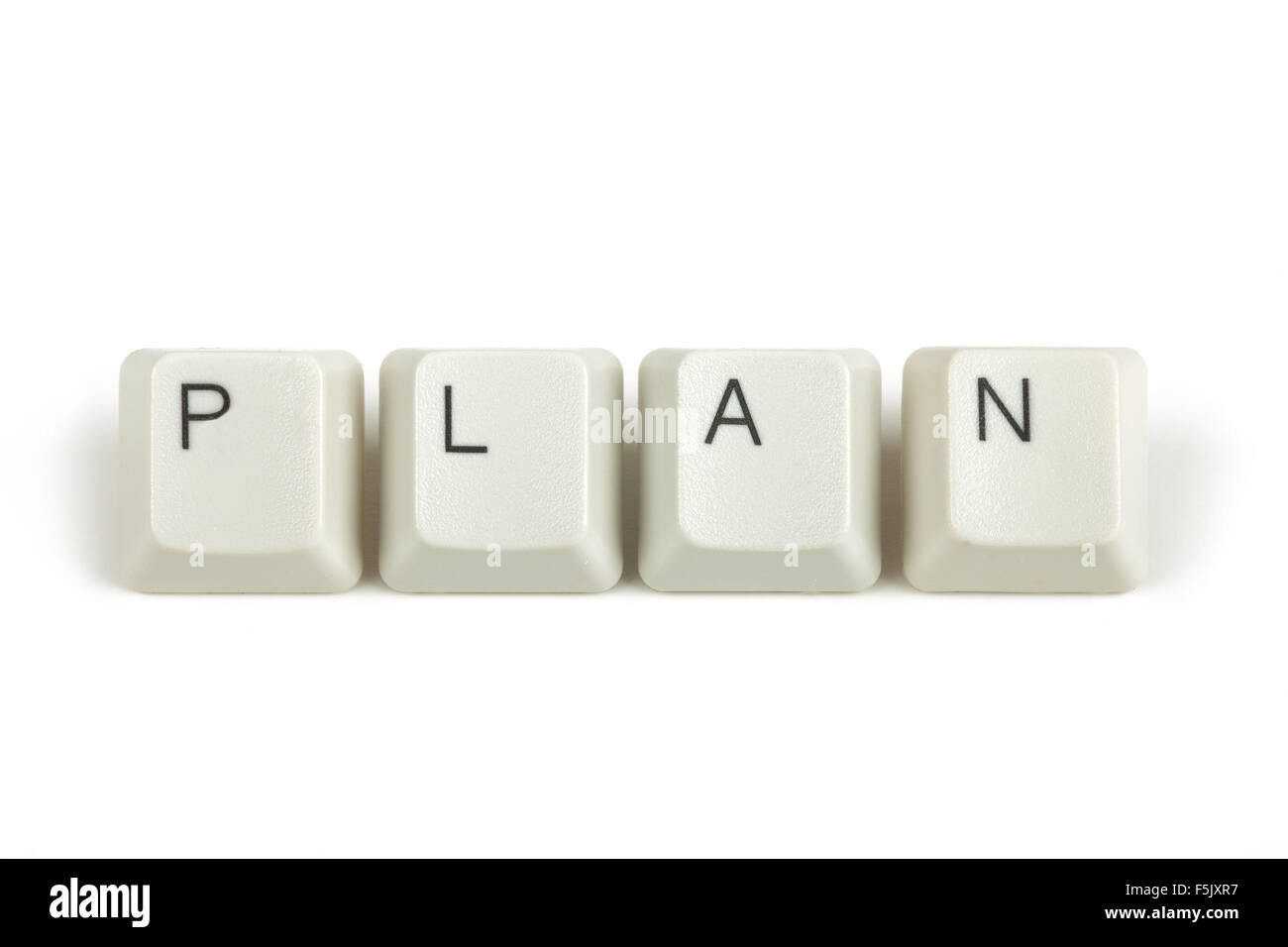 plan text from scattered keyboard keys isolated on white background ...