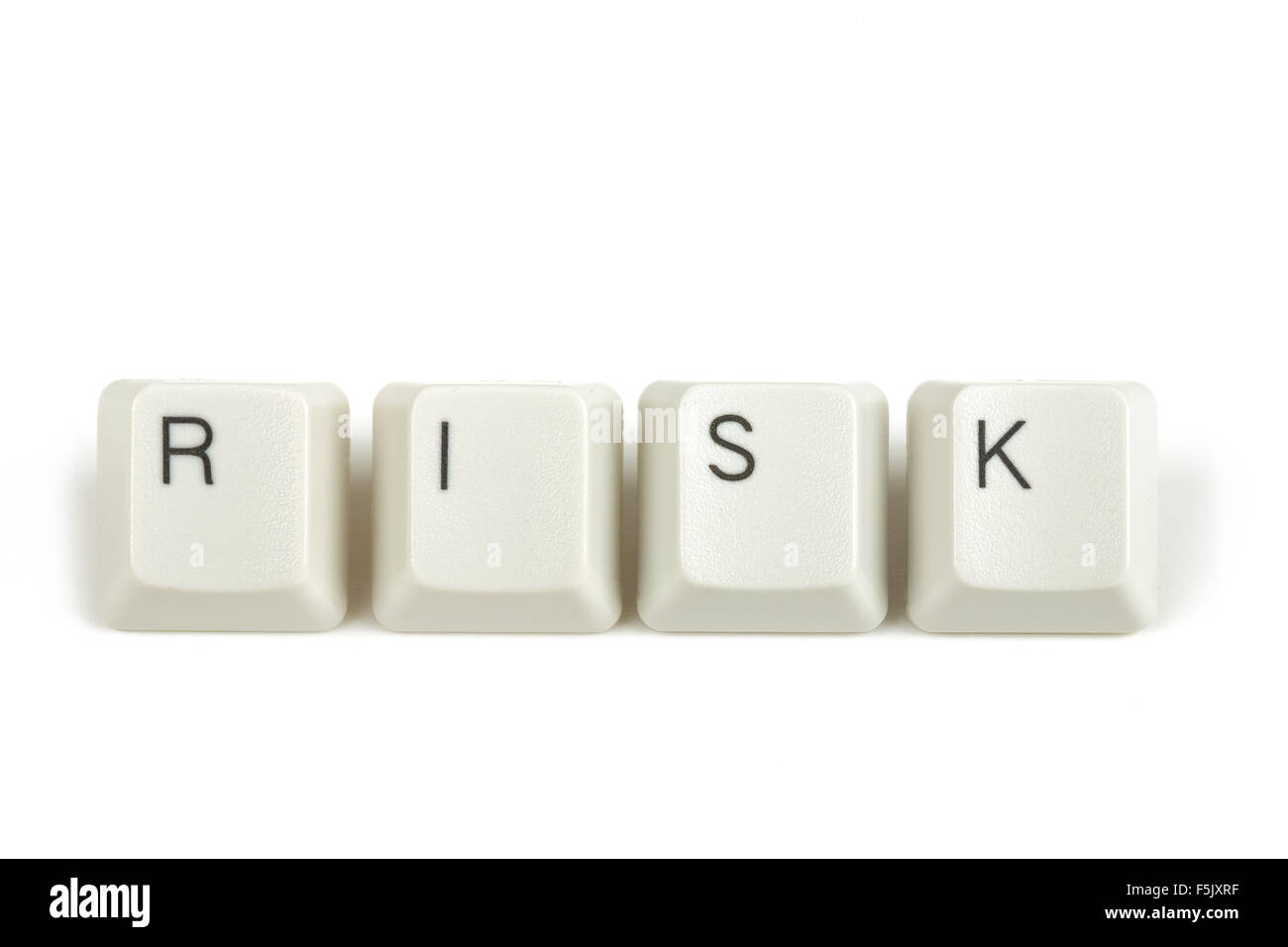 risk text from scattered keyboard keys isolated on white background ...