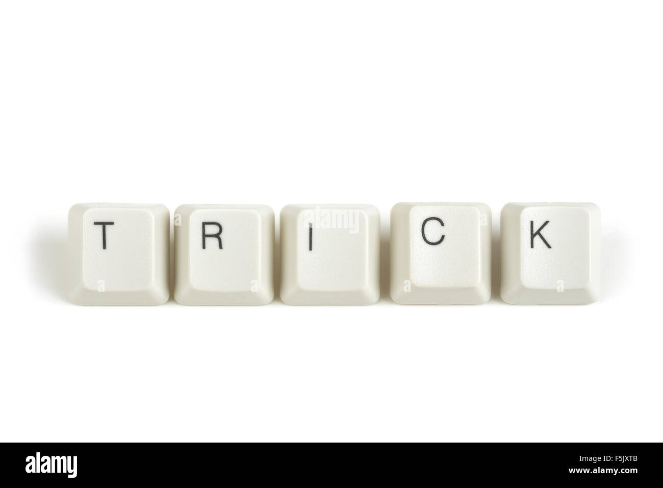 trick text from scattered keyboard keys isolated on white background ...
