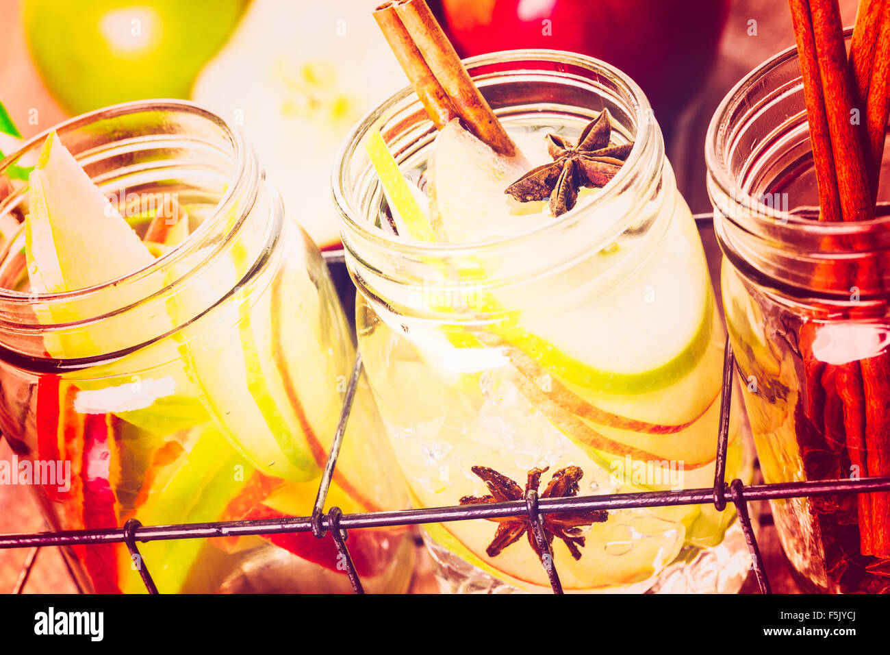 Infused apple water with cinnamon and anise Stock Photo - Alamy