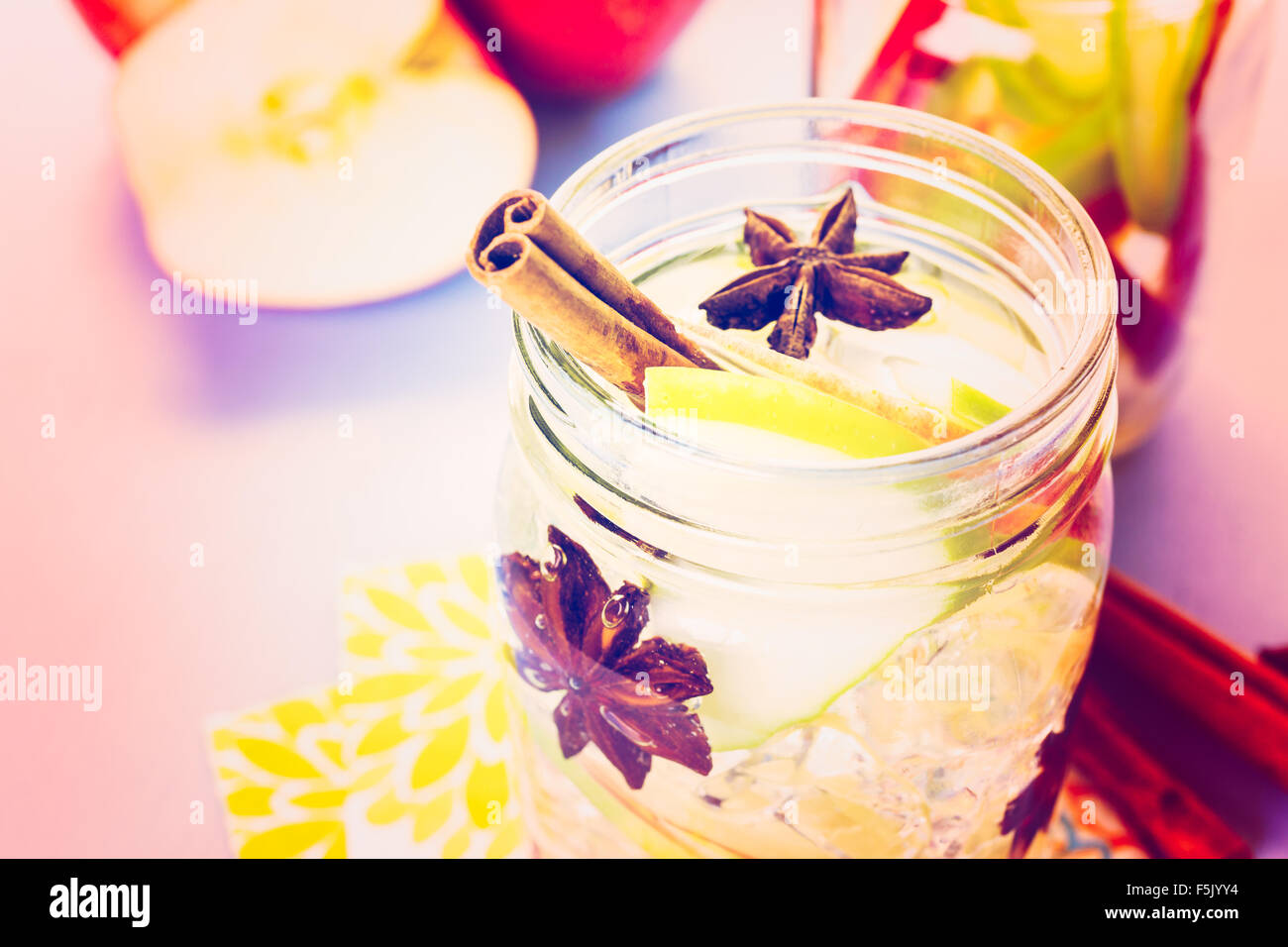 Infused apple water with cinnamon and anise Stock Photo - Alamy