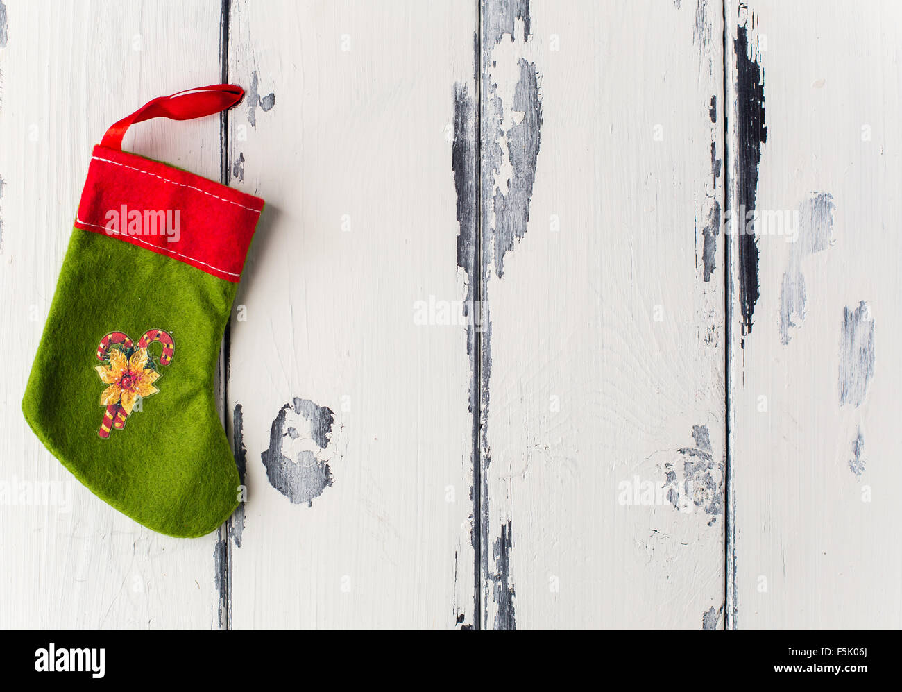 Christmas stocking on white wooden background Stock Photo - Alamy
