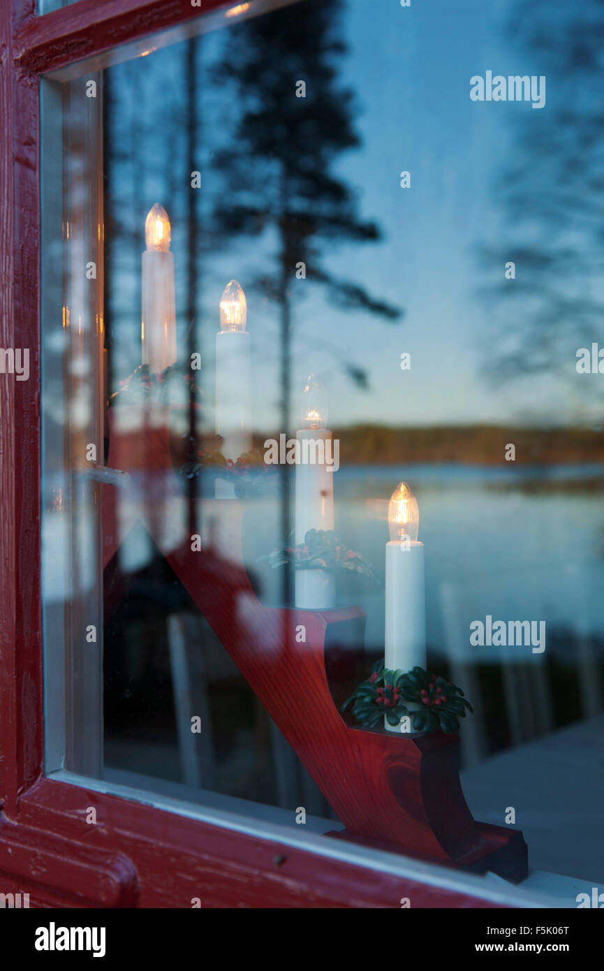 Advent lights in window Stock Photo - Alamy