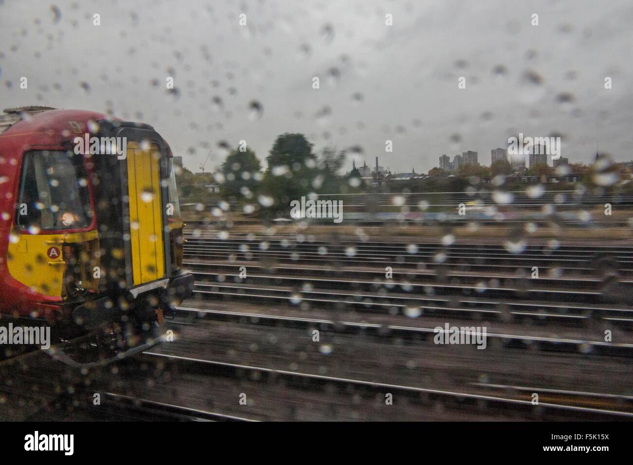 A train on a rainy day Stock Photo - Alamy