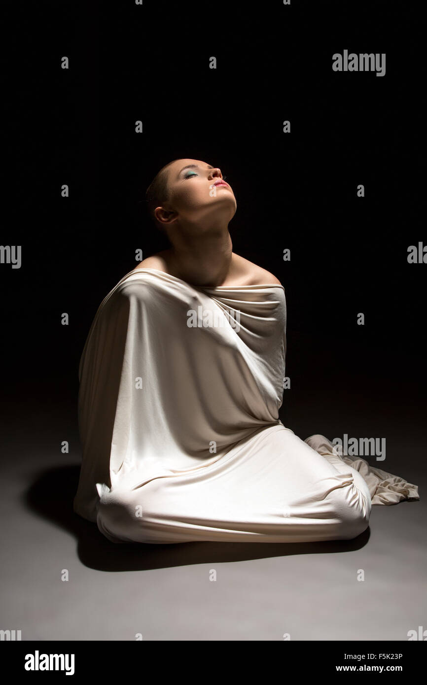 Emotion concept. Face girl expresses humility fate Stock Photo - Alamy