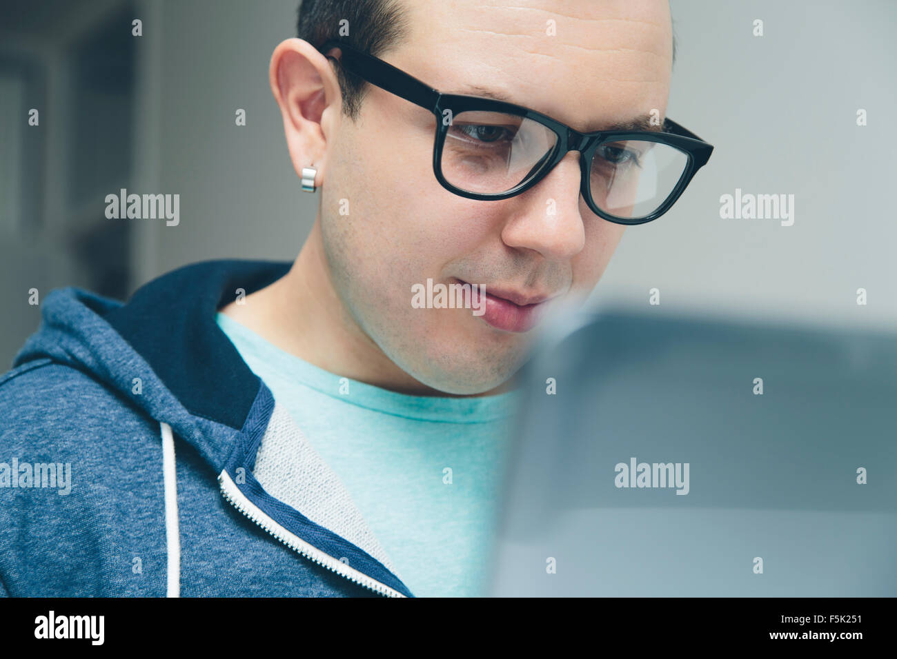 Man programming working on computer hi-res stock photography and images ...