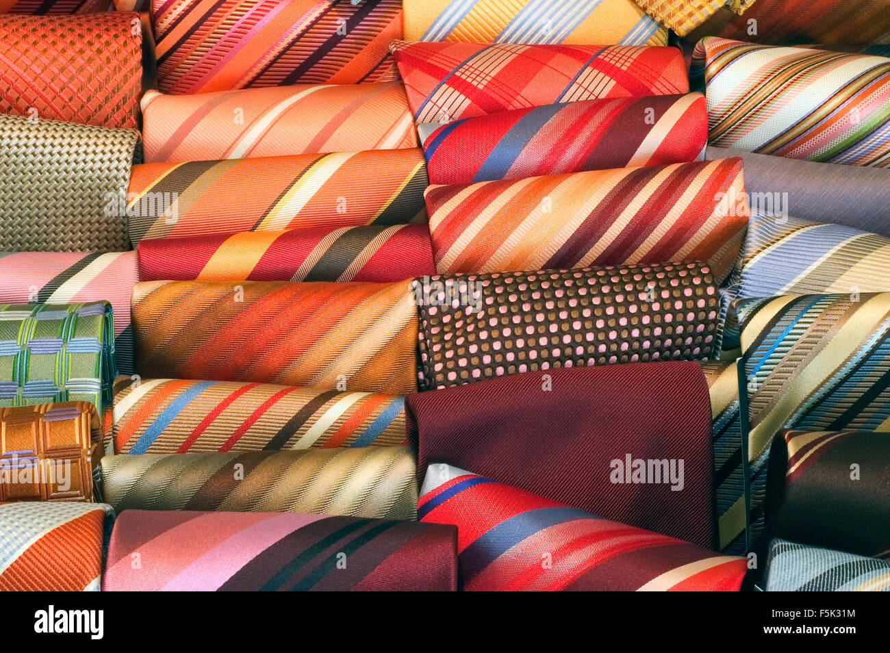 Collection of colourful ties in clothes shop Stock Photo - Alamy