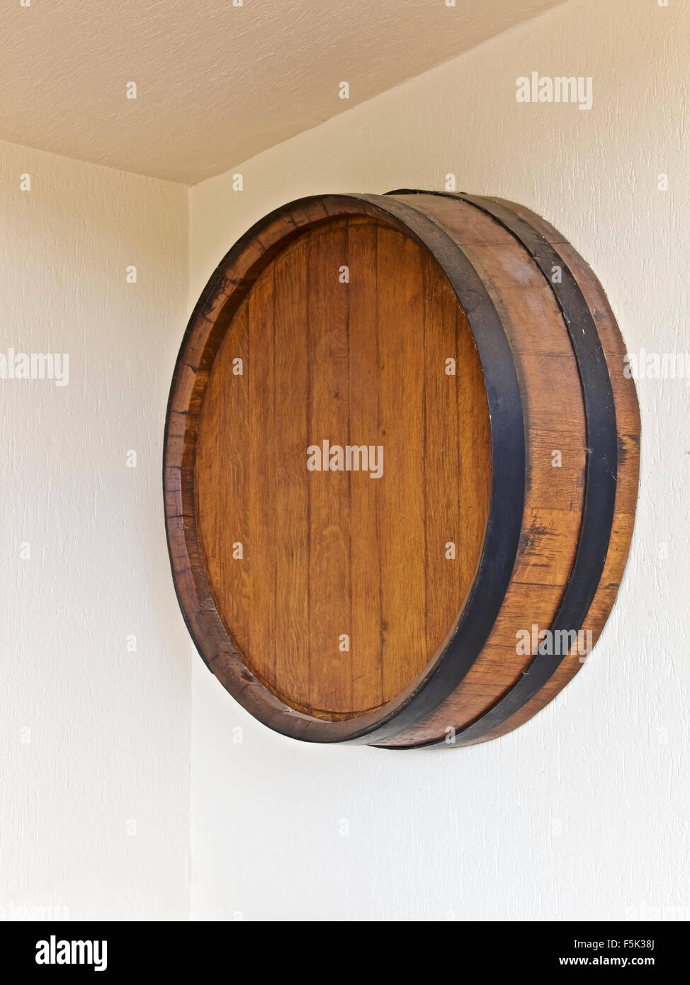 Wine round barrel on a wall, vineyard building Stock Photo - Alamy